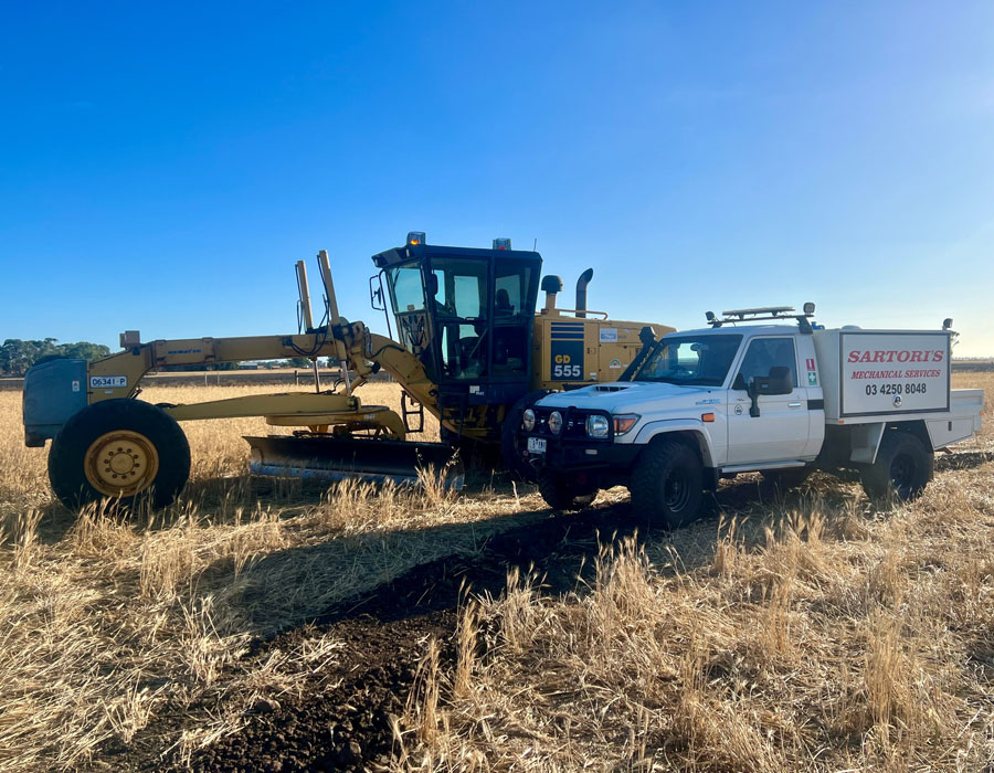 Mobile truck repair on Komatsu grader - Sartori's Mechanical